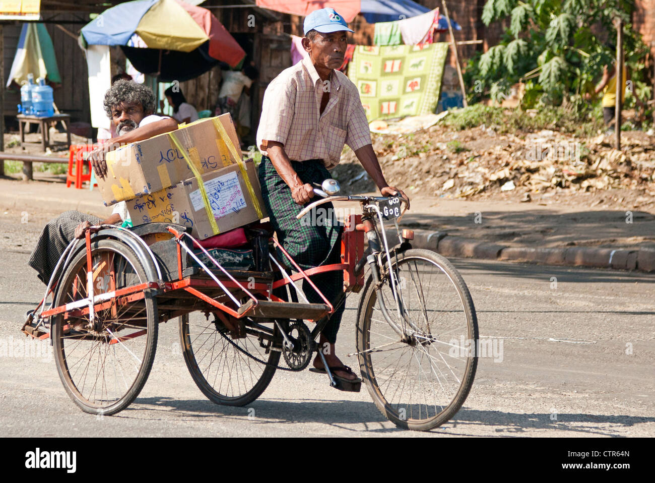 Bicycle taxi, Yangon, Myanmar Stock Photo - Alamy