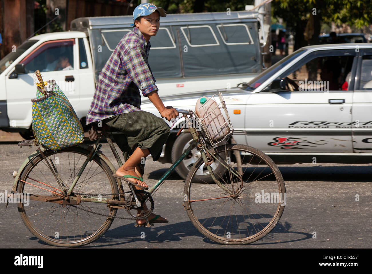 Bicycle rider, Yangon, Myanmar Stock Photo - Alamy