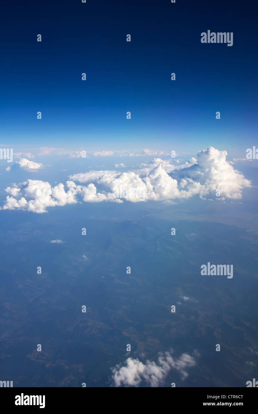 Blue sky above white clouds Stock Photo - Alamy