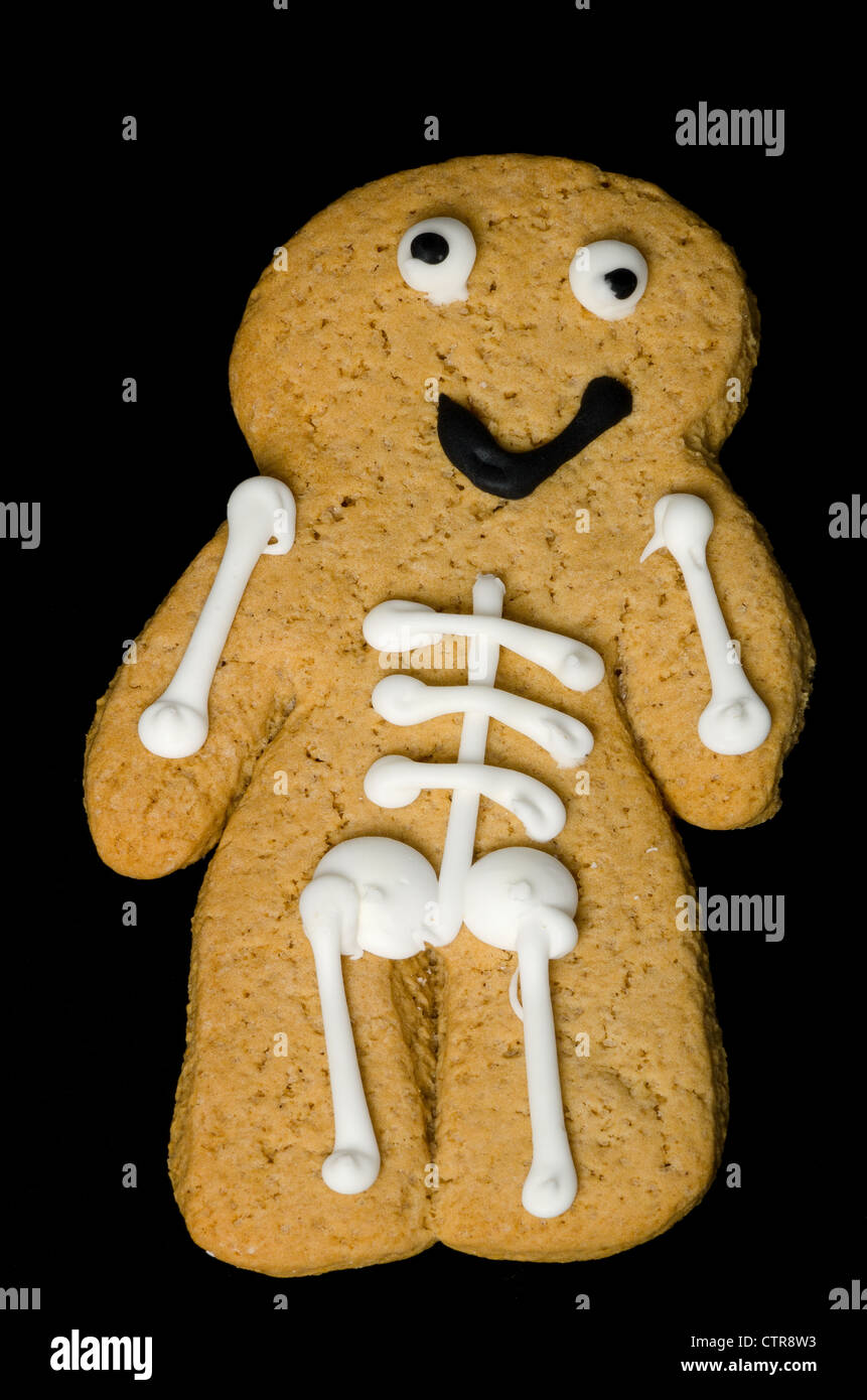 Gingerbread man skeleton - studio shot with a black background Stock ...