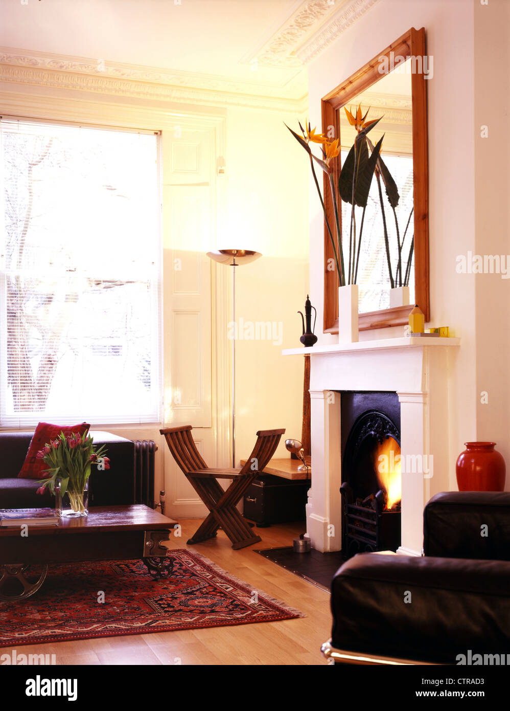 private house view to window and fire Stock Photo - Alamy