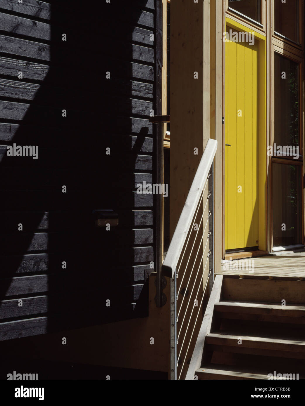 the boundary house oblique exterior detail with yellow door Stock Photo ...