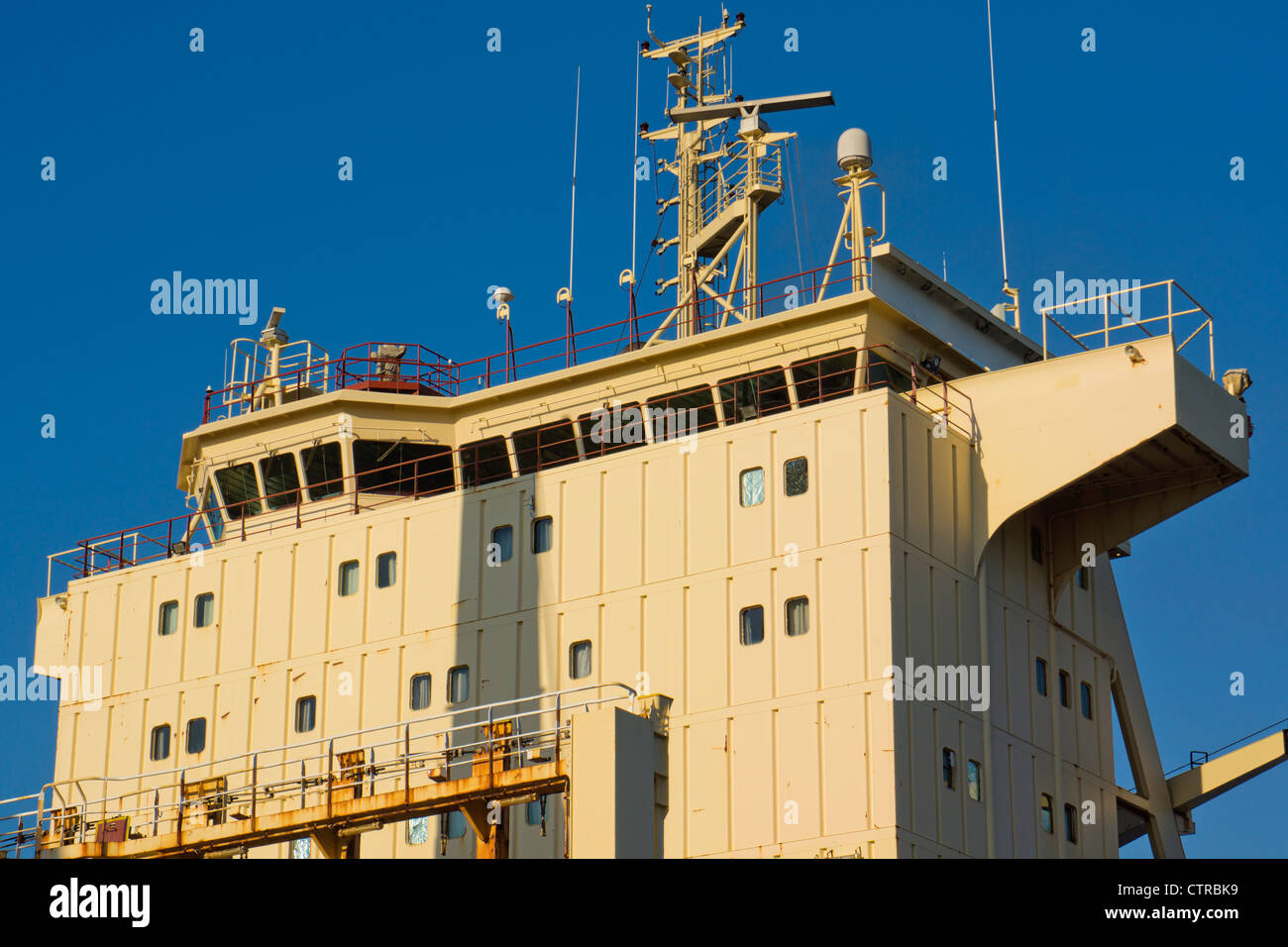 The bridge (nautical) of a large sea container cargo ship, with a ...