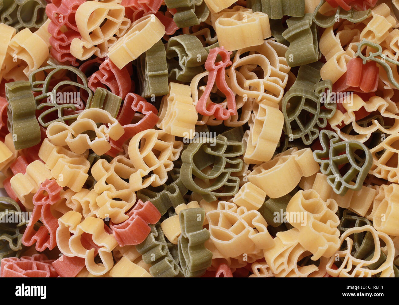 Italian pasta of durum wheat semolina with tomato and spinach in form ...