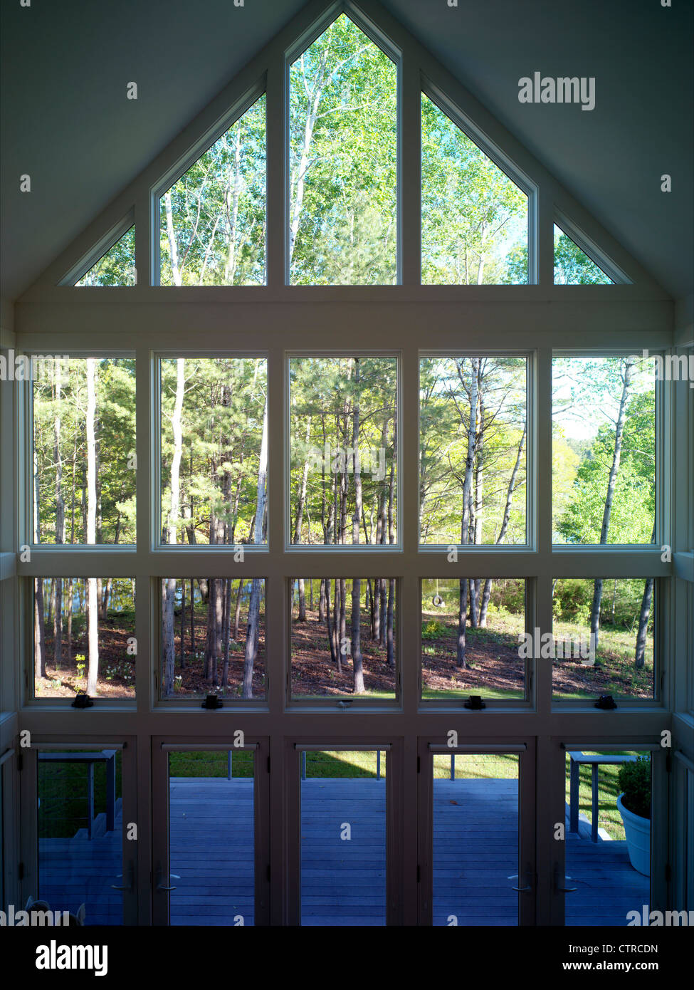 private house detail of double height windows Stock Photo - Alamy