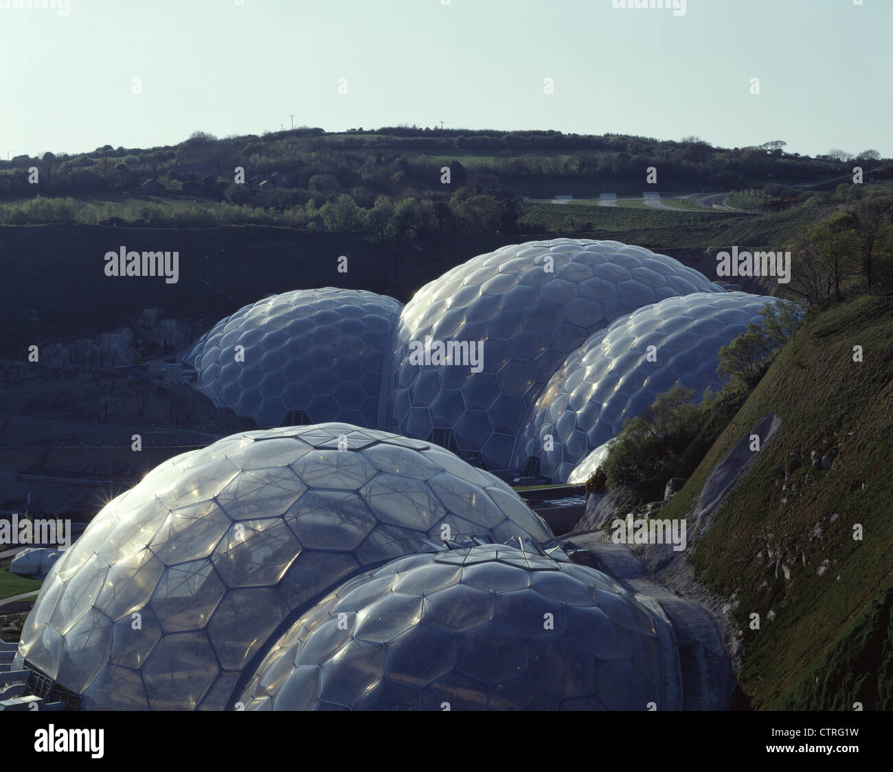 eden project landscape view across pit of whole site - evening light ...