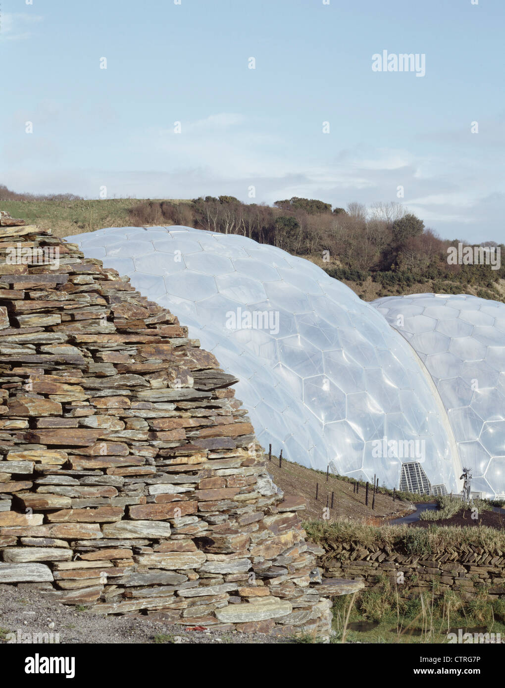 eden project detail of stone dome and new domes Stock Photo - Alamy