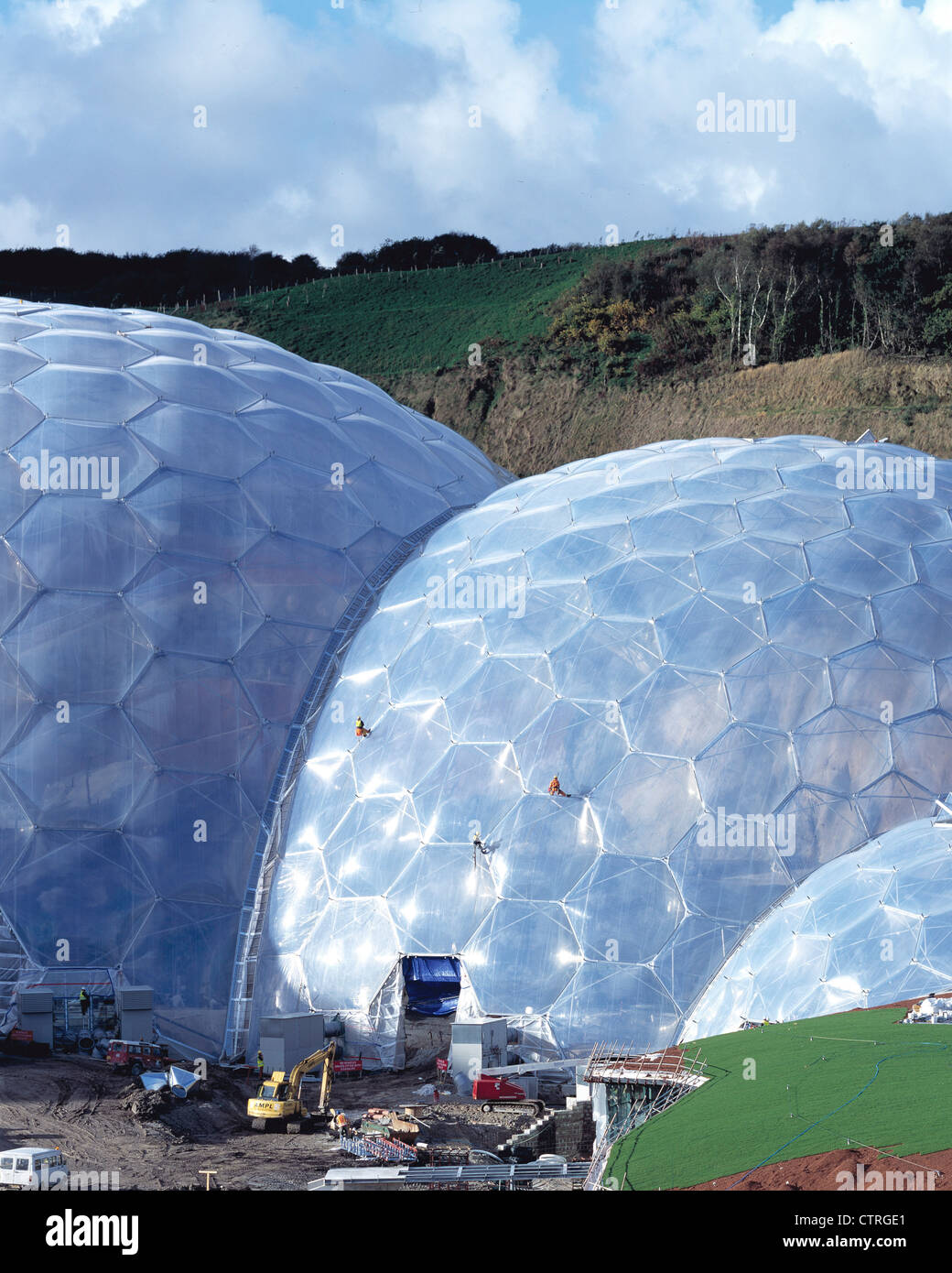 eden project distant shot of domes under construction Stock Photo - Alamy