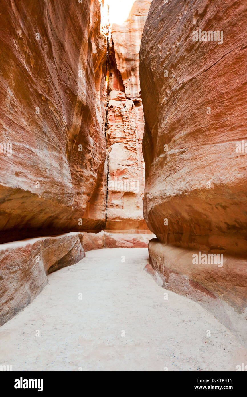 The Siq - narrow gorge to ancient city Petra, Jordan Stock Photo - Alamy