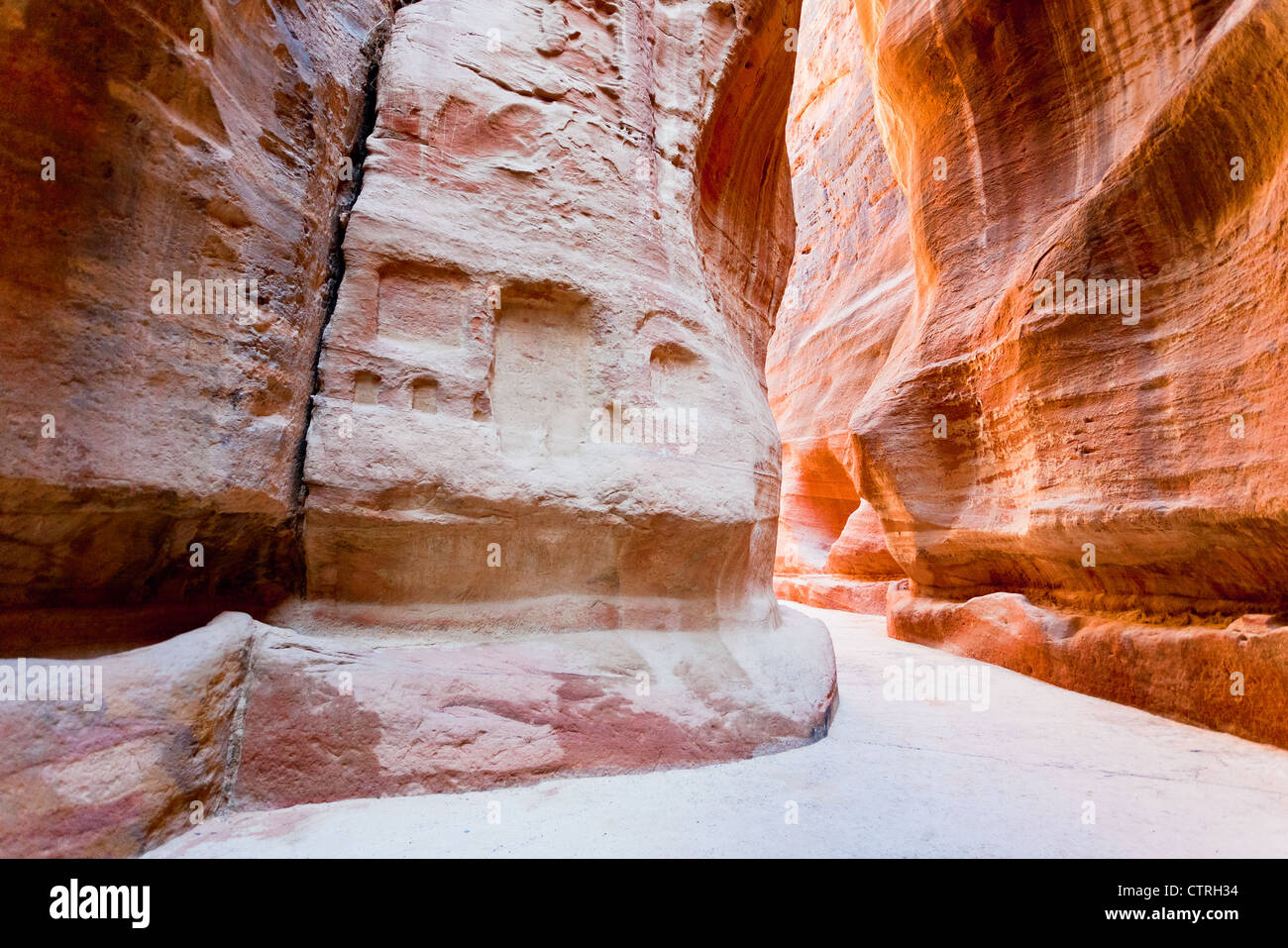 The Siq - narrow gorge to ancient city Petra, Jordan Stock Photo - Alamy