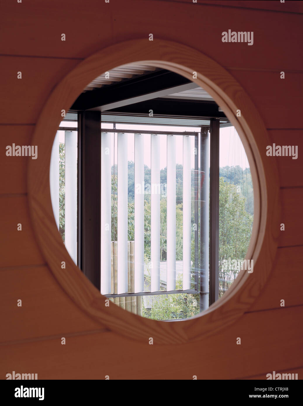 spine house view through oval window Stock Photo - Alamy