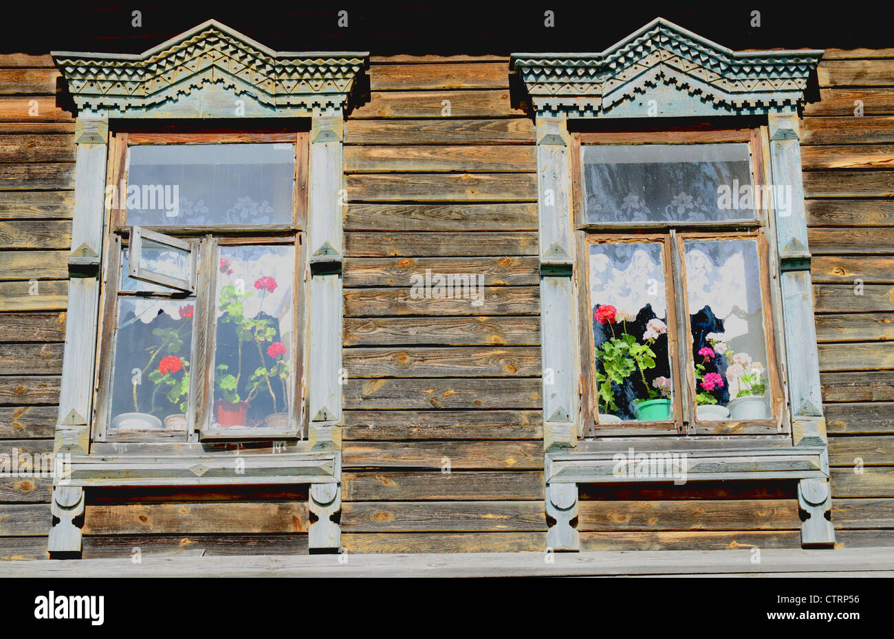 Traditional old Russian windows carved plat band of wood house Stock ...