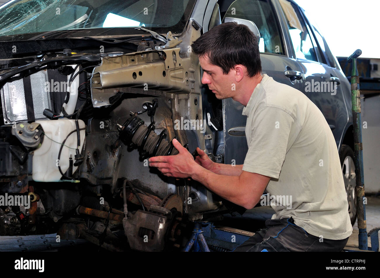 Car body worker Stock Photo - Alamy