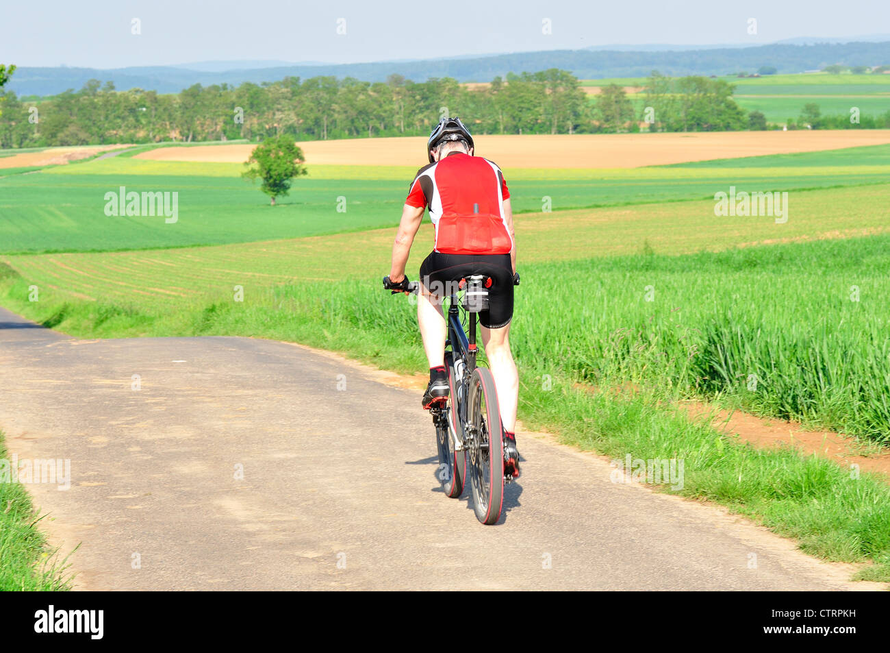 Man on bicycle Stock Photo - Alamy