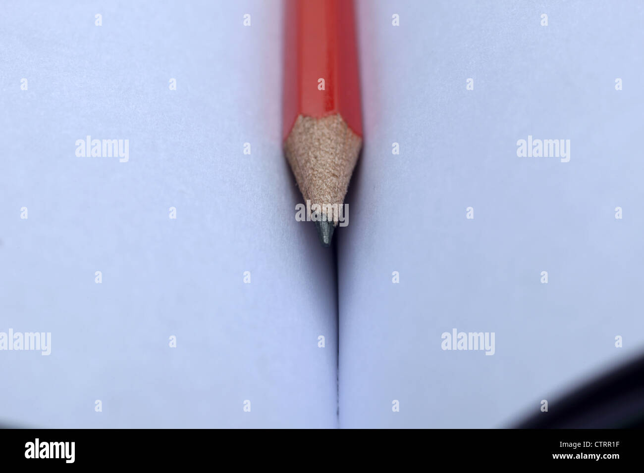 Open book with pencil Stock Photo - Alamy