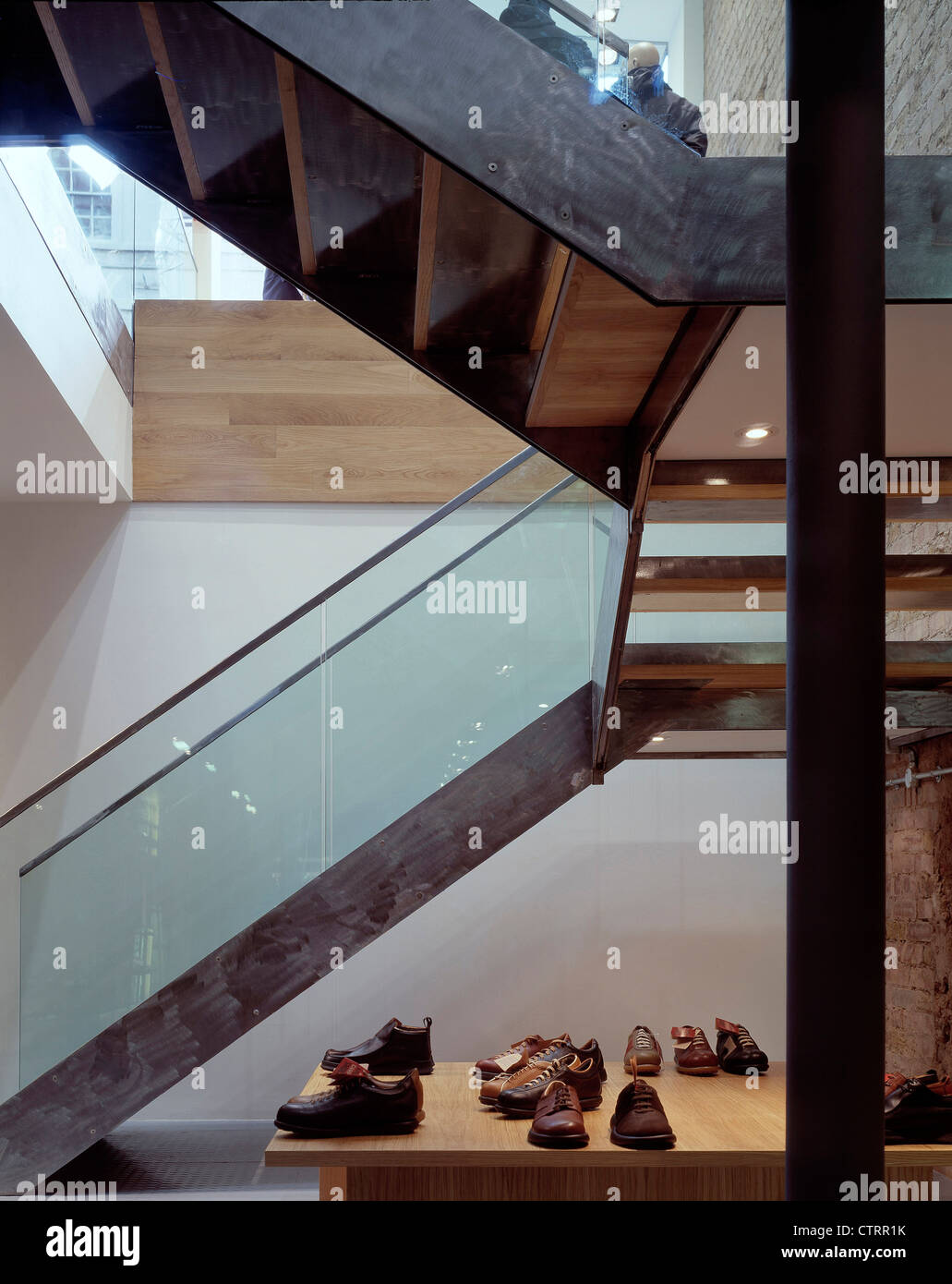 woodhouse shop basement floor detail over shoes to stairs Stock Photo ...