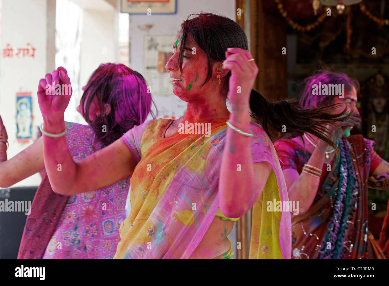 Women covered in colourful dye celebrating the Holi festival, Festival ...