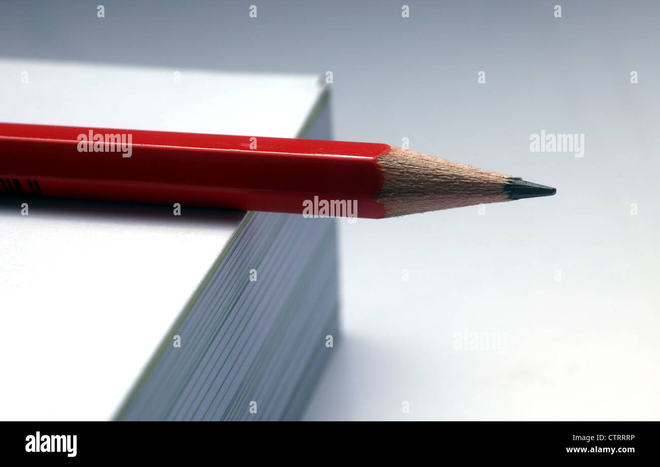 Pencil on book Stock Photo - Alamy