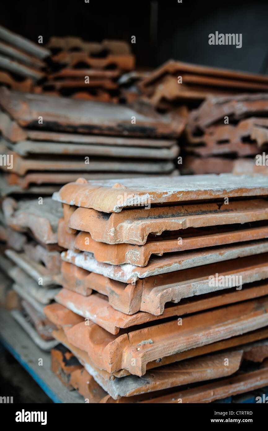 stack of the orange tiles in warehouse Stock Photo - Alamy
