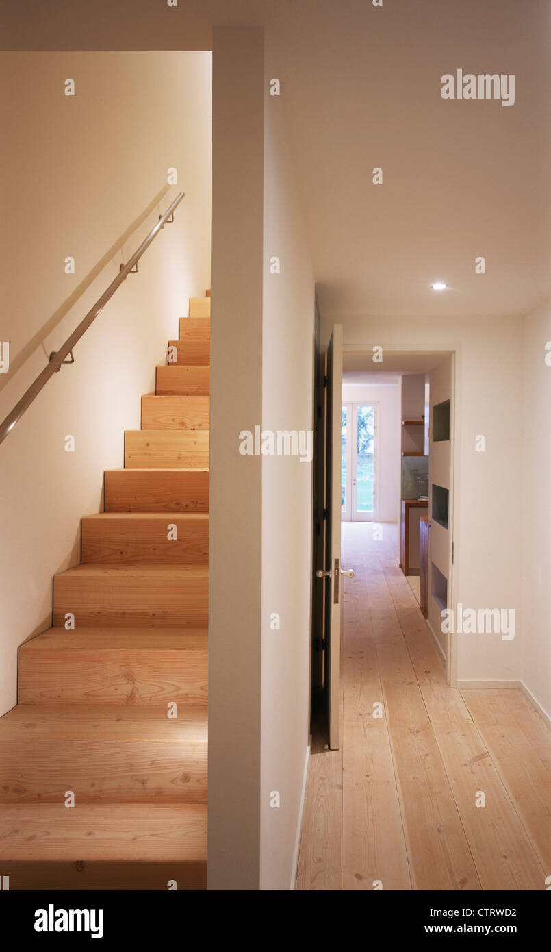 private house view down corridor with stairs Stock Photo - Alamy