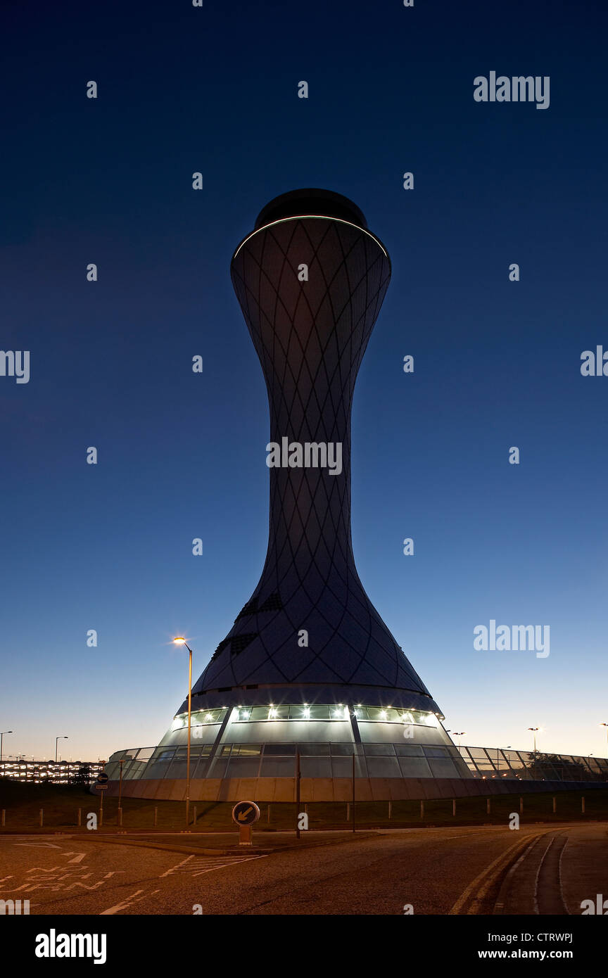 air traffic control tower dawn view lit from approach road Stock Photo ...