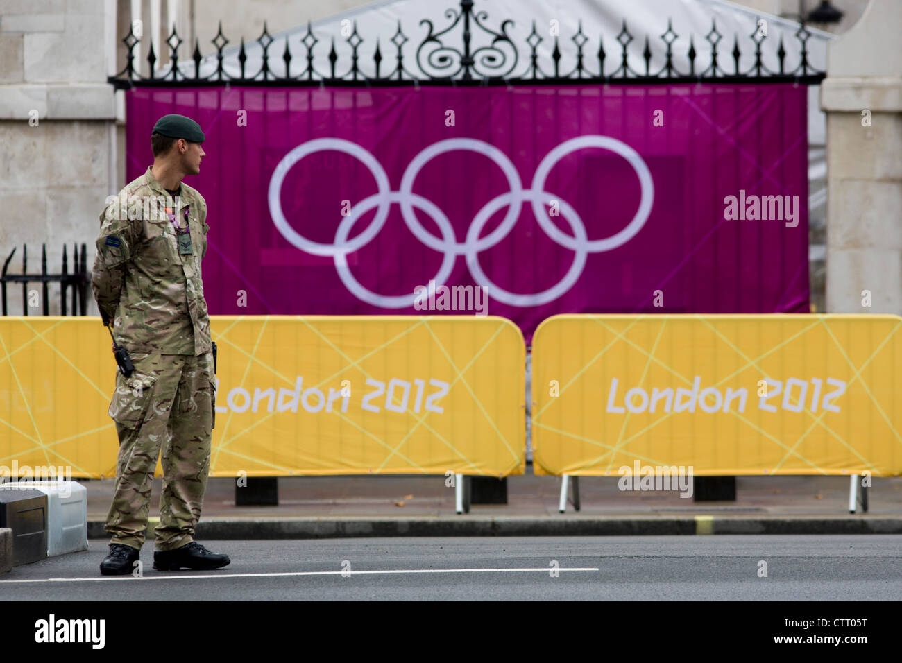 A soldier of the British army stand guarding the entrance to the ...