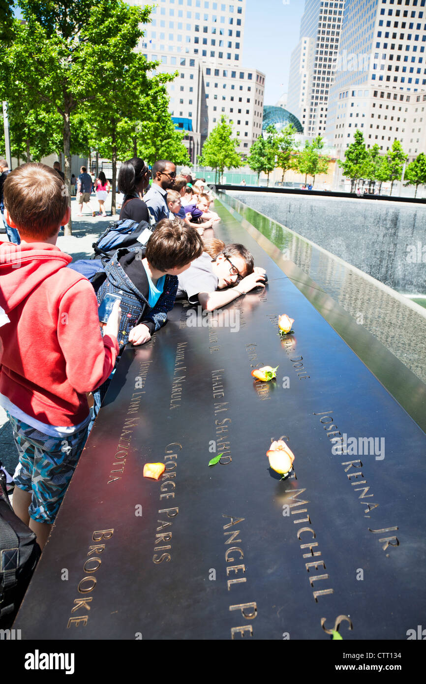 ground zero new york memorial waterfall with names inscribed round the ...