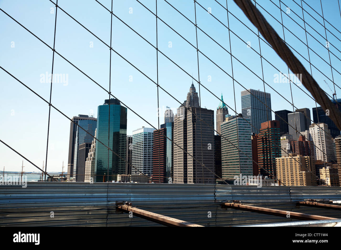 Looking through the wires holding up Brooklyn Bridge towards Lower ...