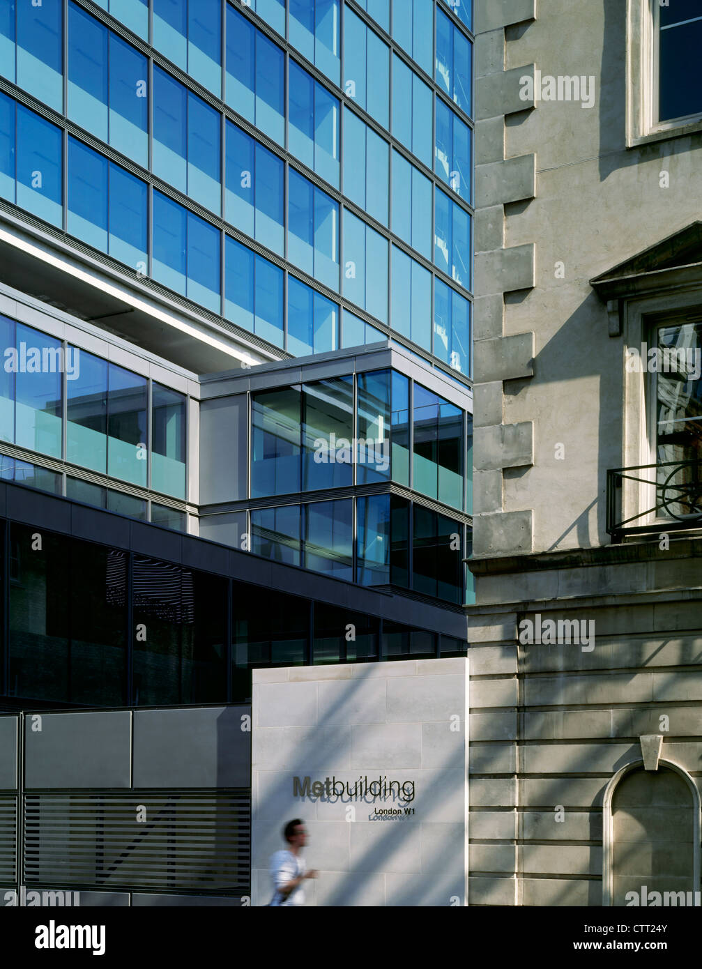 met building yard entrance on windmill st Stock Photo - Alamy