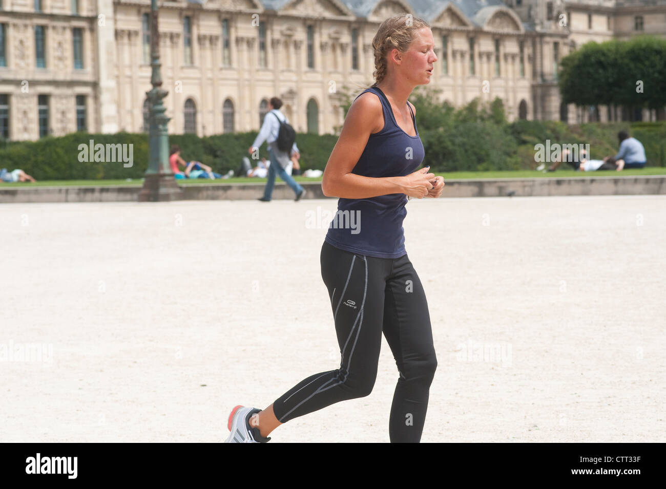 Paris, France - Young woman doing jogging Stock Photo - Alamy