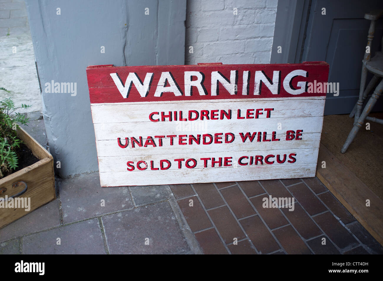 Joke Warning Sign outside Vintage Shop Stock Photo - Alamy
