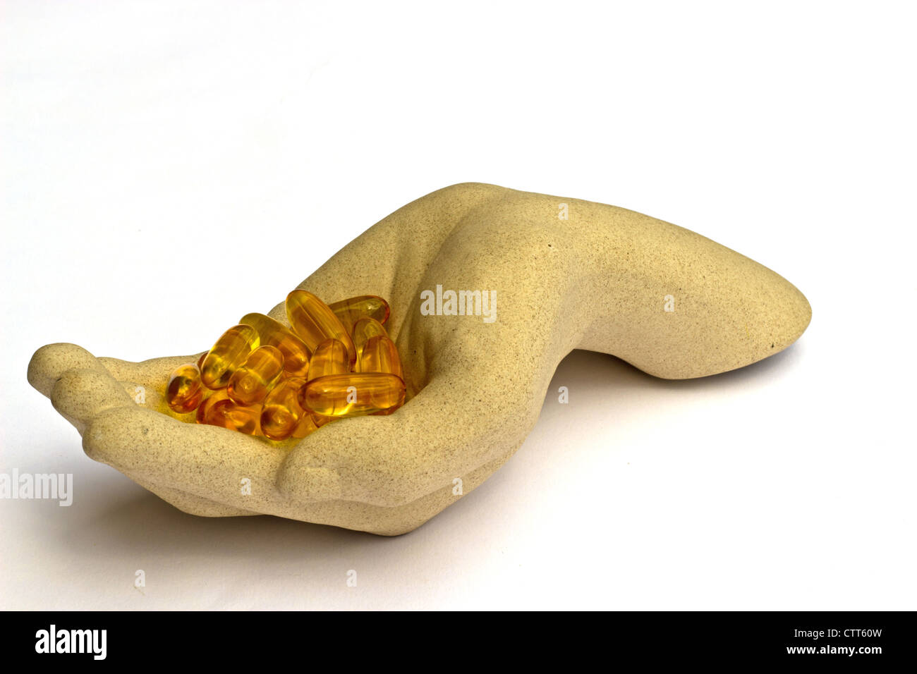 Tablets in hand Stock Photo - Alamy