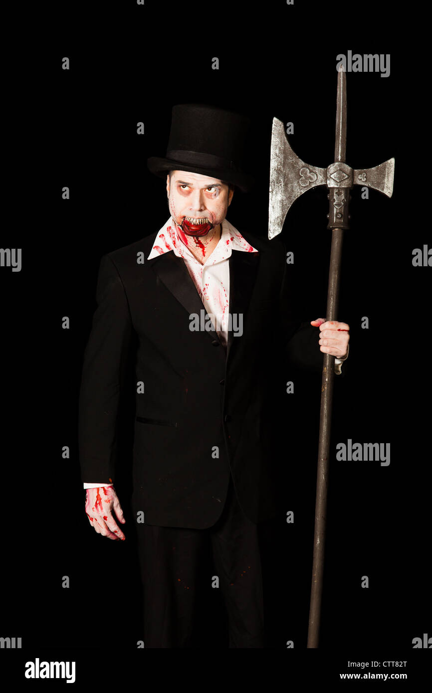 A zombie groom poses with an ancient weapon Stock Photo - Alamy