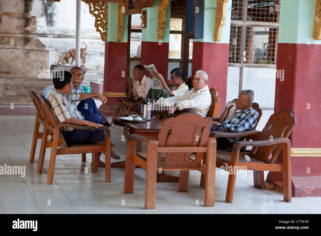Myanmar, Burma, Bagan. Burmese Men Talking over a Cup of Tea Stock ...