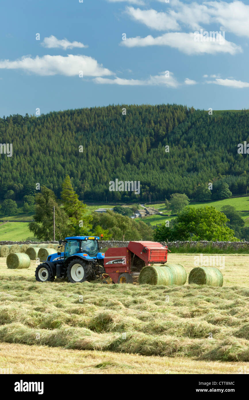 Bale making in Lower Wharfedale Stock Photo - Alamy