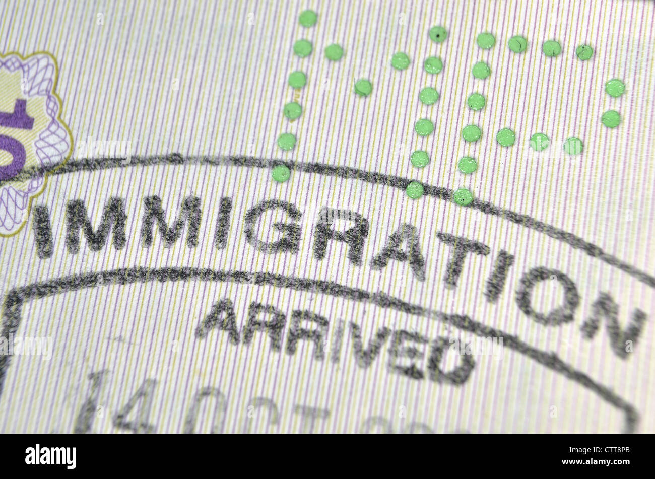 immigration control passport stamp fragment; focus on Immigration word ...