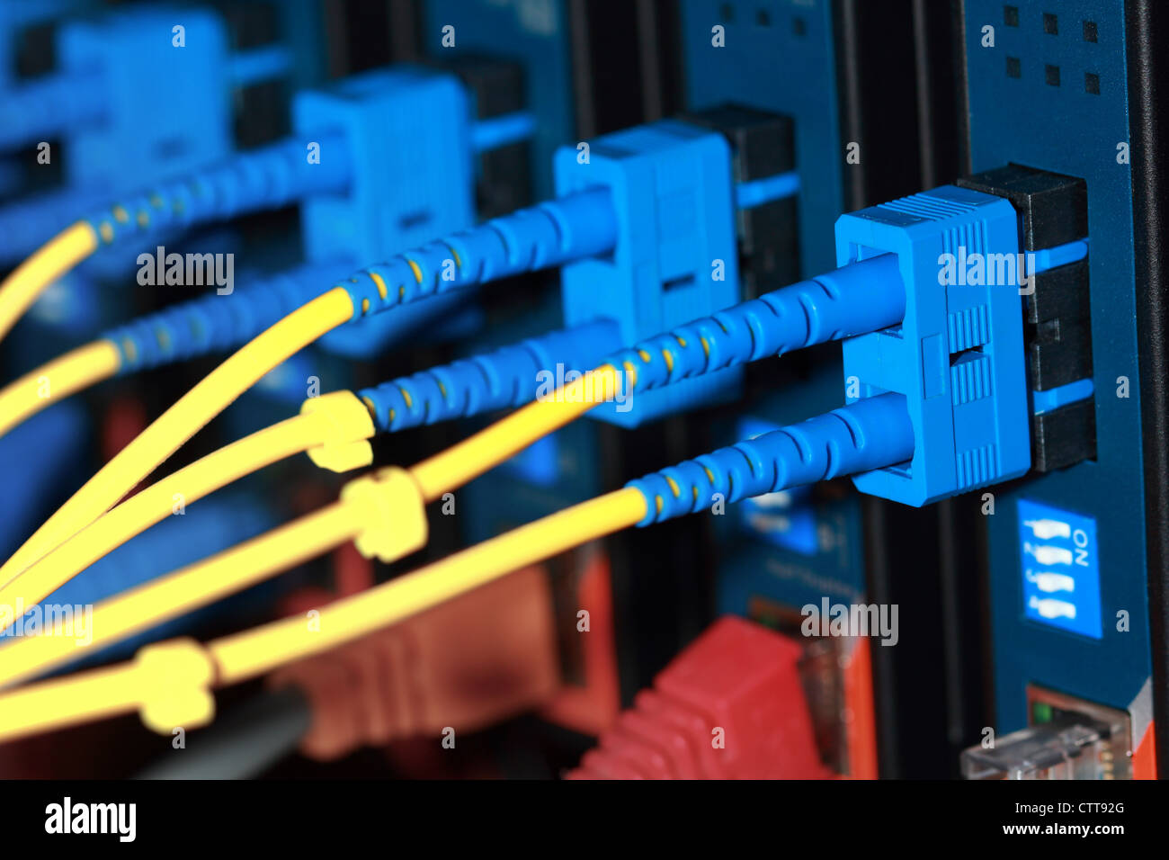 fiber optic cable plug with converter Stock Photo - Alamy