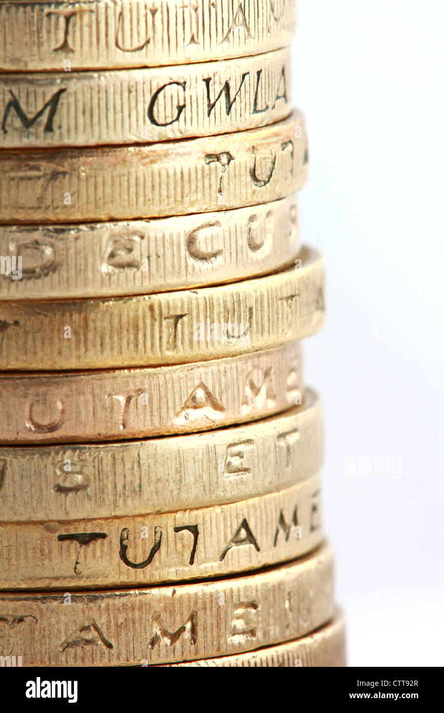 one pound coin stack close up shot Stock Photo - Alamy