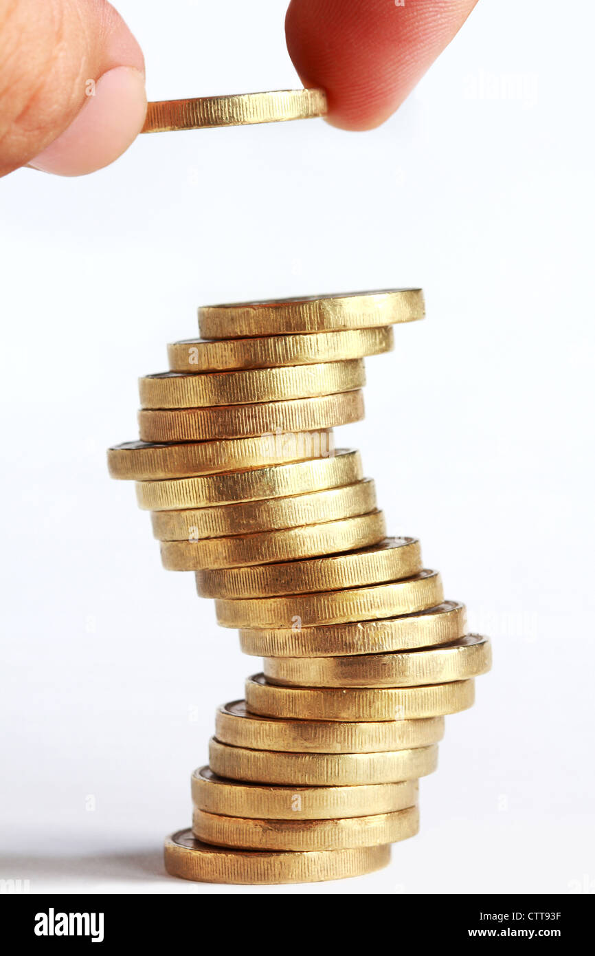 zigzag gold coin stack, currency Stock Photo - Alamy