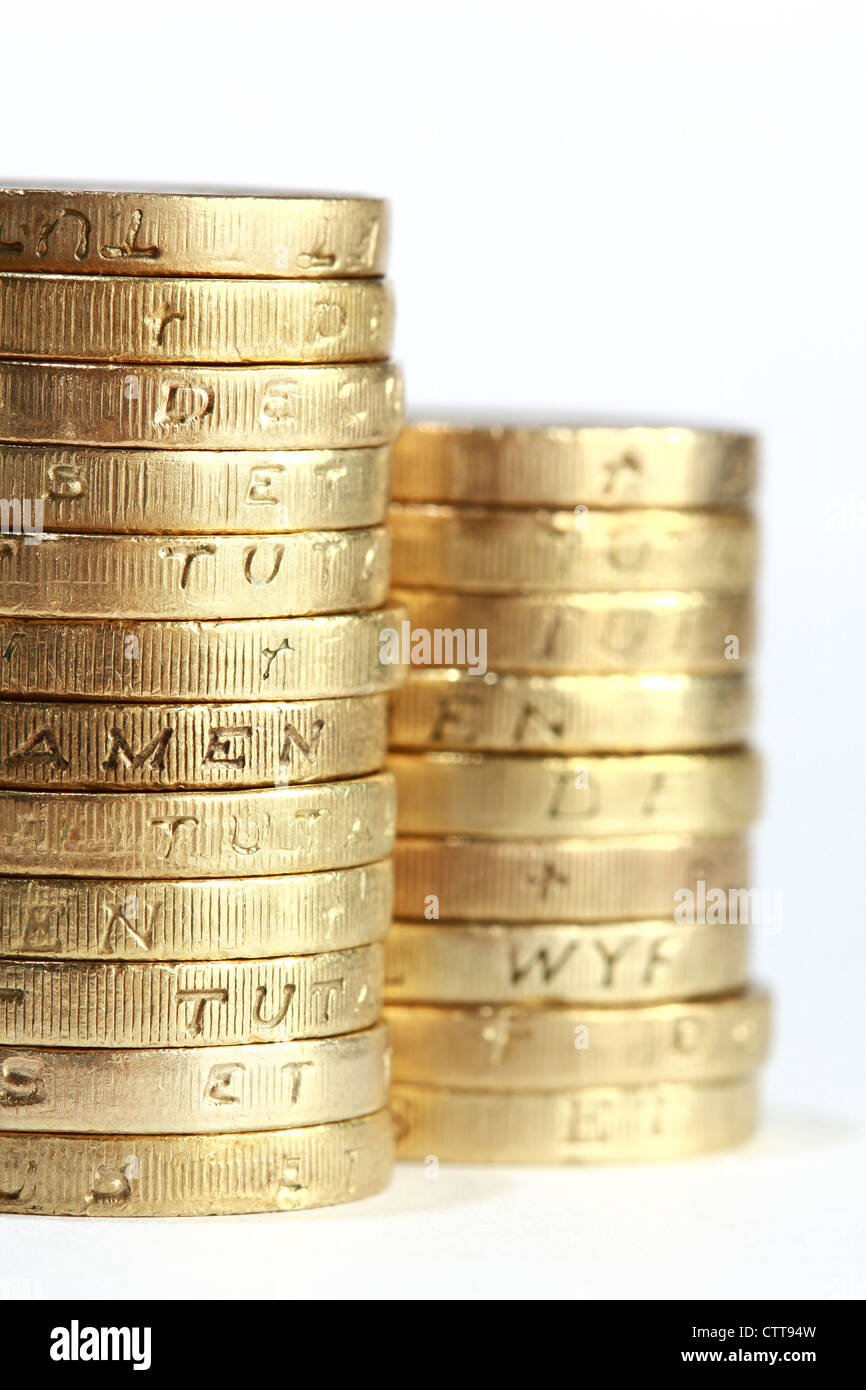 one pound coin stack close up shot Stock Photo - Alamy