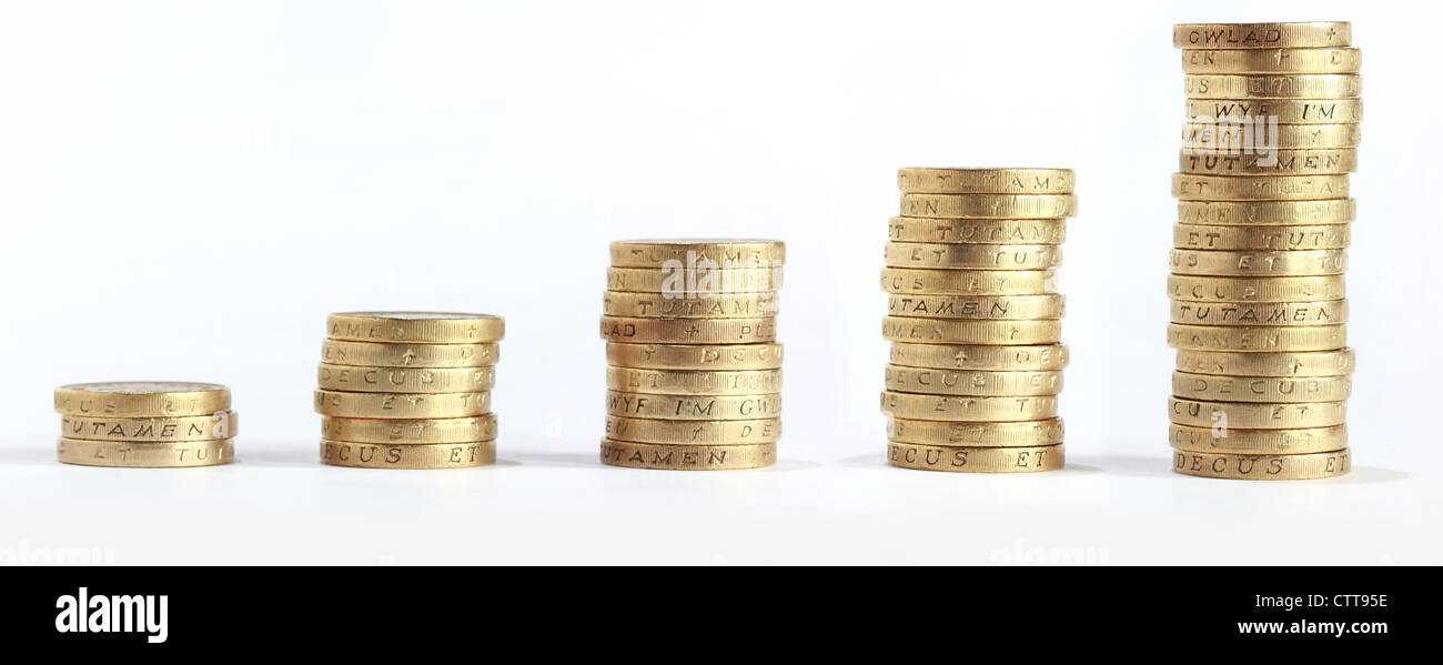 one pound coin stack arrange growong up on white background Stock Photo ...