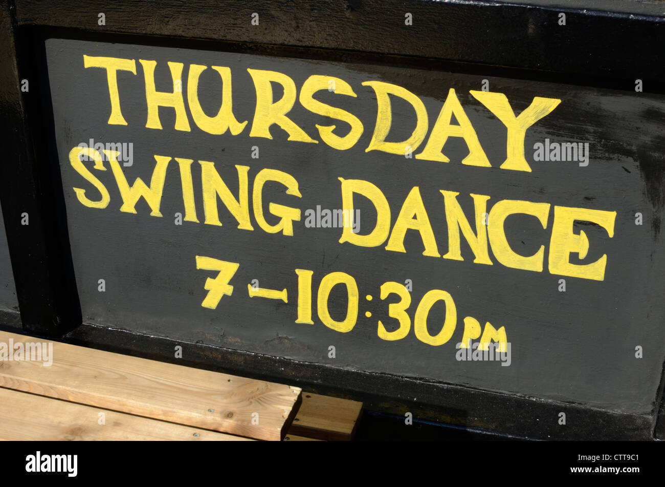 A board outside a pub promoting a swing dance night, London, UK Stock ...