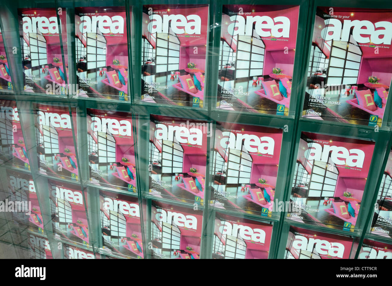 Area property magazine in Foxtons estate agent window Stock Photo - Alamy