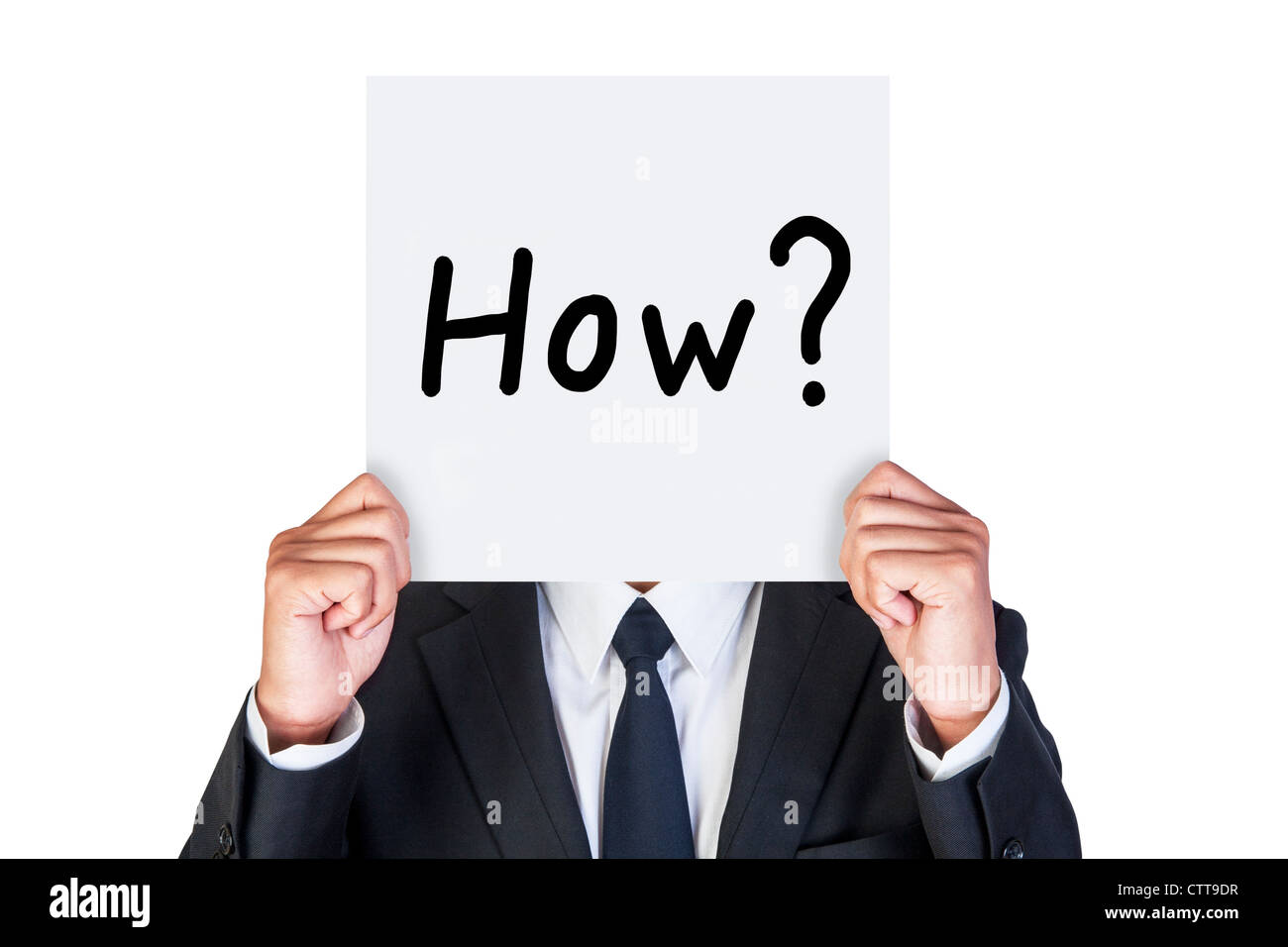 Businessman holding paper that say HOW Stock Photo - Alamy