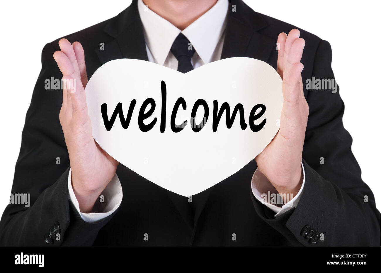 Businessman holding paper written welcome Stock Photo - Alamy