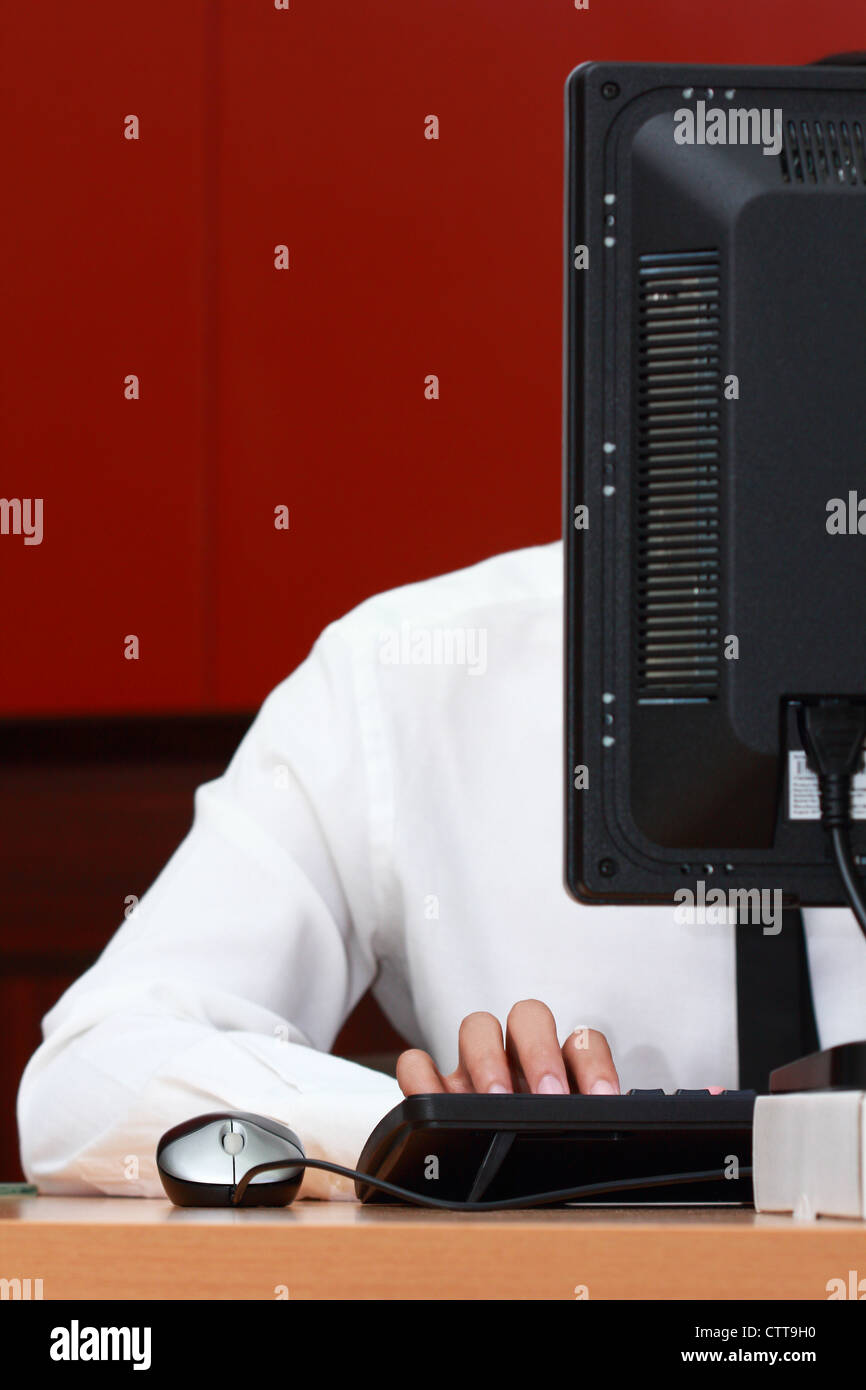 A man working with computer in the office Stock Photo - Alamy
