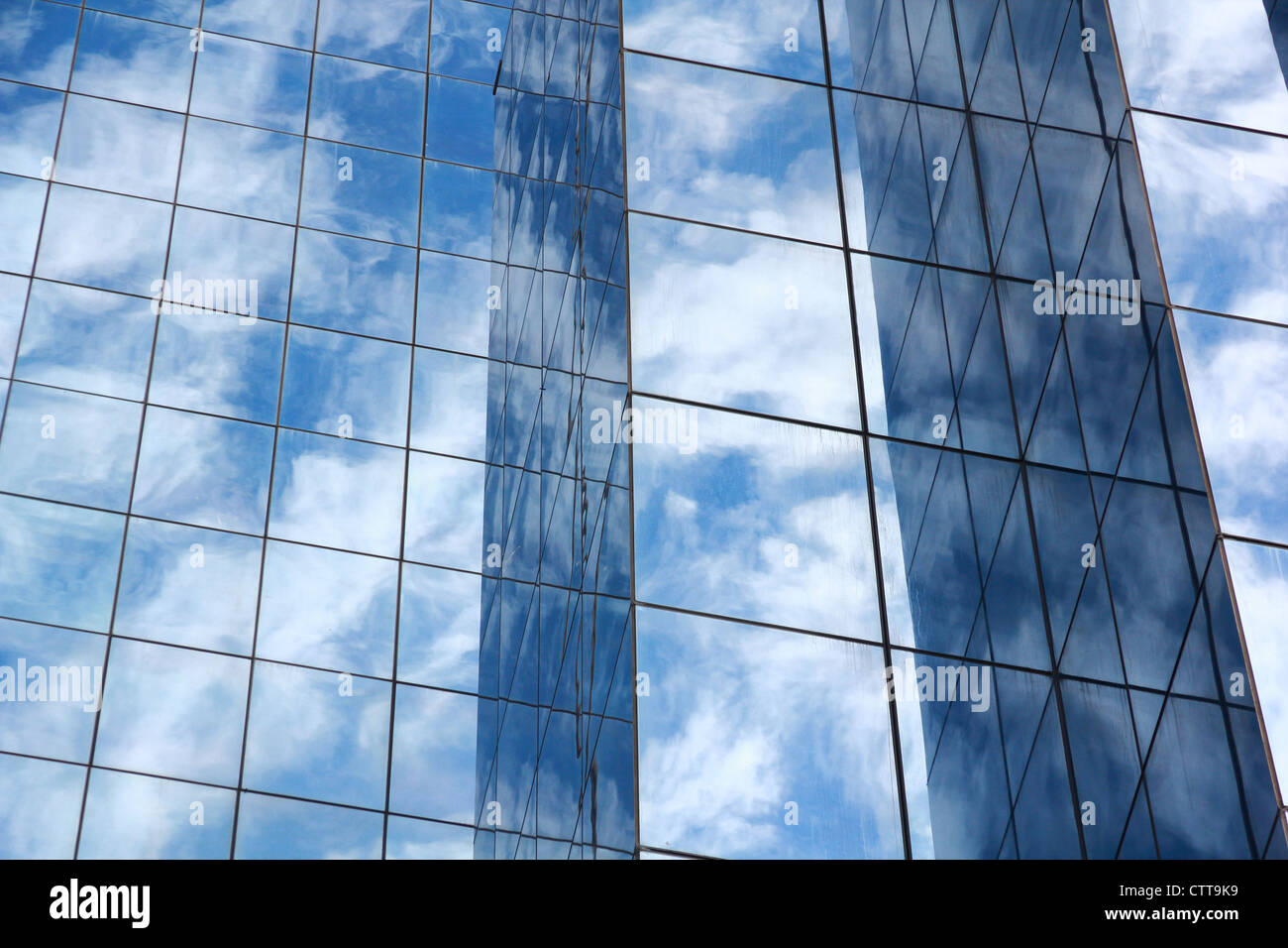 blue mirror glass building with cloud, blue sky and sunlight Stock ...