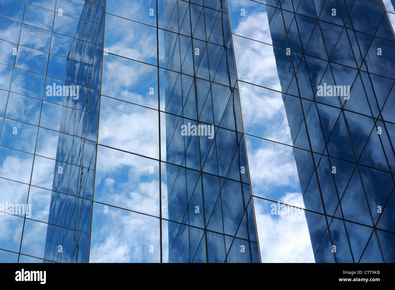 blue mirror glass building with cloud, blue sky and sunlight Stock ...
