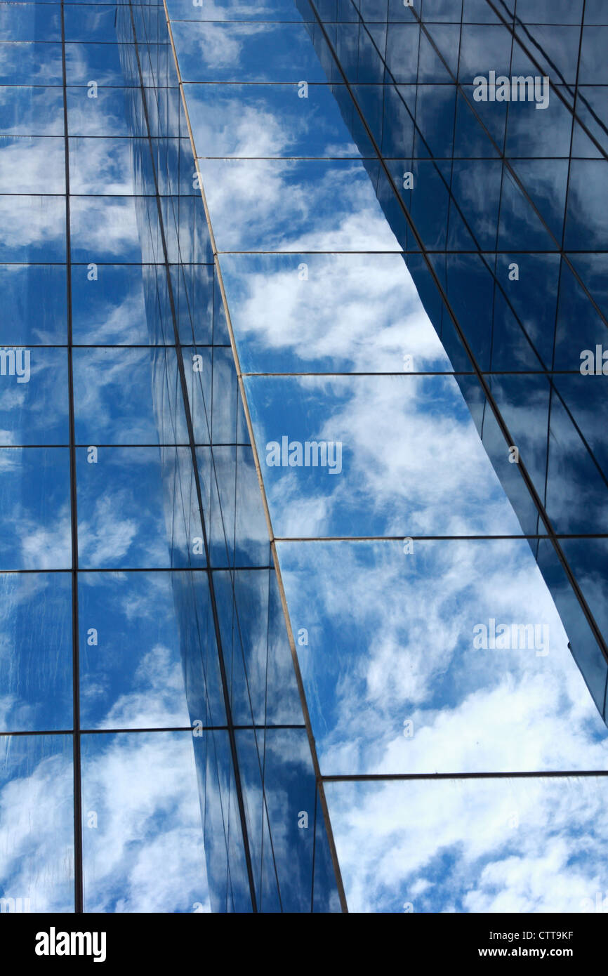 blue mirror glass building with cloud, blue sky and sunlight Stock ...