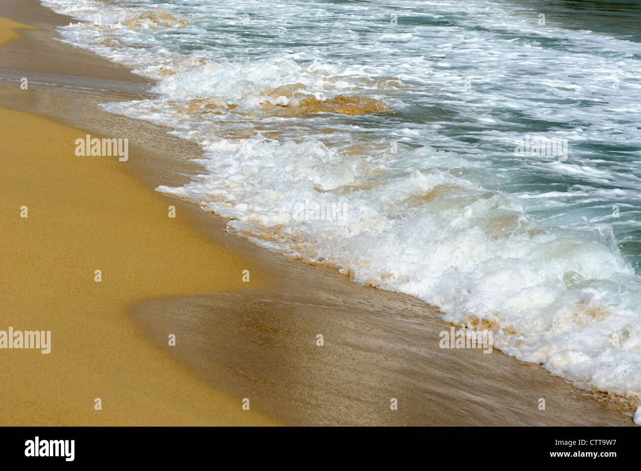 Waves lapping beach hi-res stock photography and images - Alamy